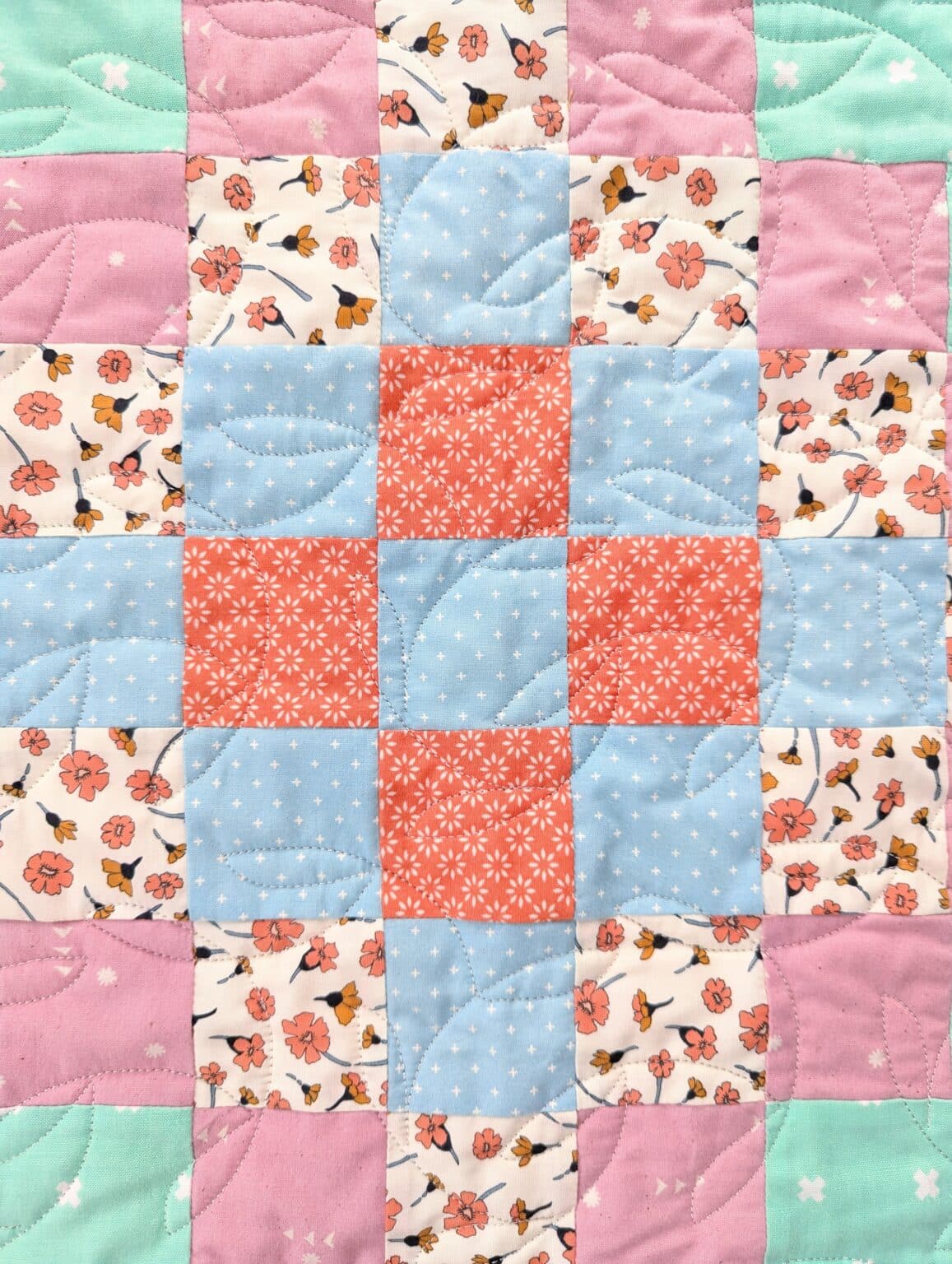 A Finished Scrappy Checkered Garden Quilt - Ma Tante Quilting
